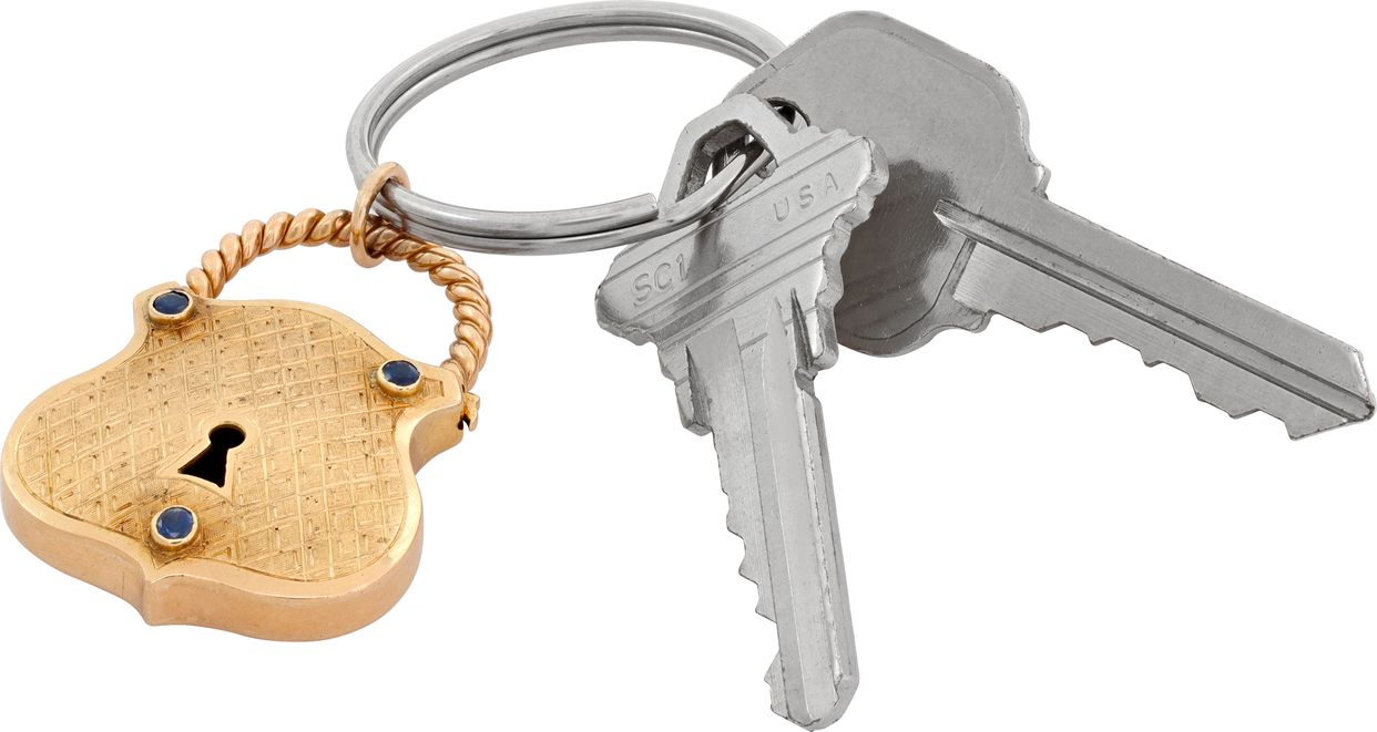 18k gold lock pendant with blue sapphires | Gray & Sons Jewelers