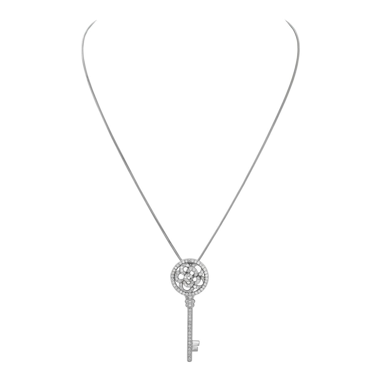 Flower-skeleton key pendant in 18k white gold with platinum