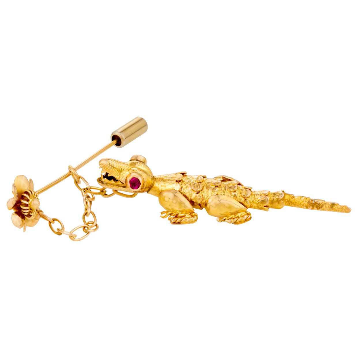 "GO GATORS" alligator pin with ruby eyes in 18k yellow gold.