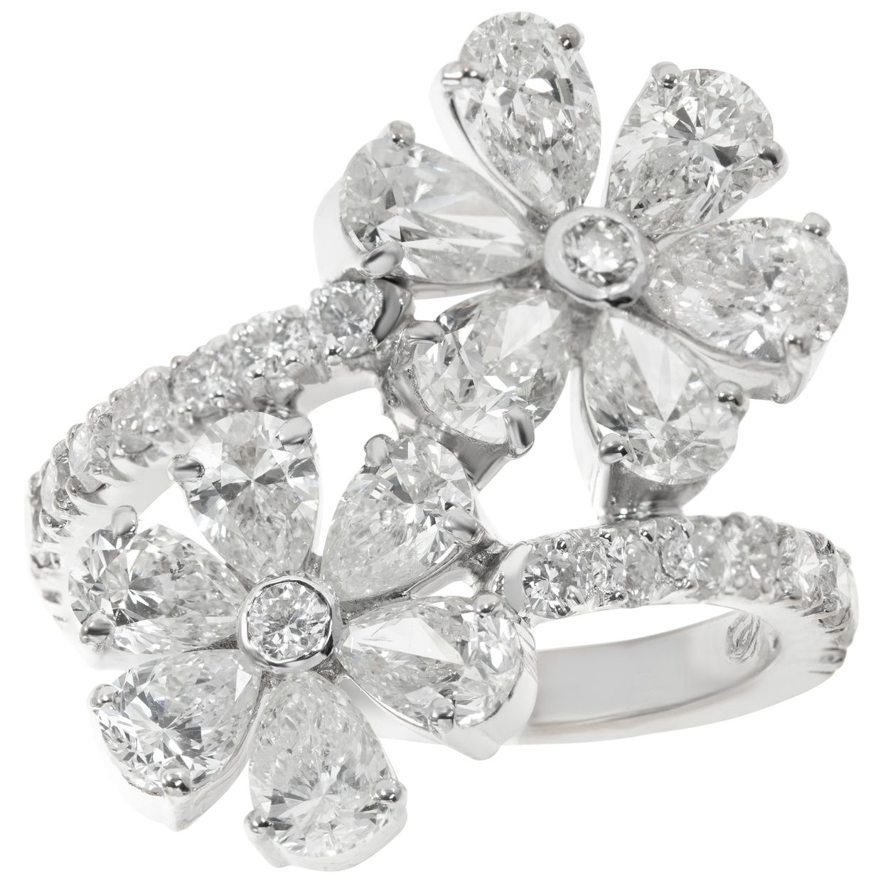 Pear & round brilliant cut diamonds flower ring in 18k | Gray & Sons